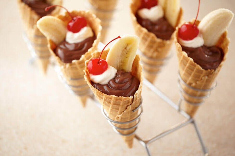 Chocolate Pudding In a Cone with Banana and Maraschino Cherries Recipe ...
